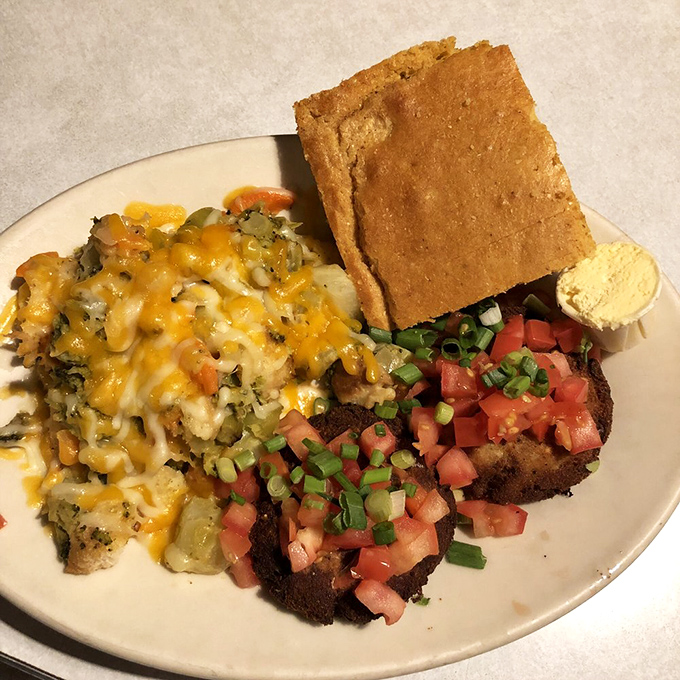 Cornbread and salmon cakes&mdash;a plate that honors Southern traditions while adding enough modern flair to keep things interesting.