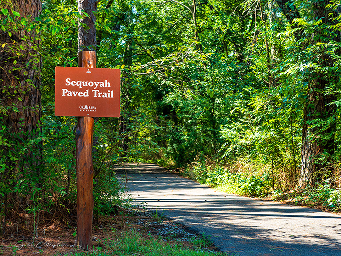 The paved trail beckons like a green invitation to leave your worries behind and remember what your legs were designed for.