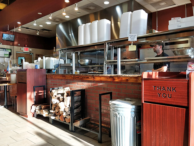 Smoke, steel, and wood&mdash;the holy trinity of serious barbecue. That "Thank You" sign knows you'll be grateful after your meal.