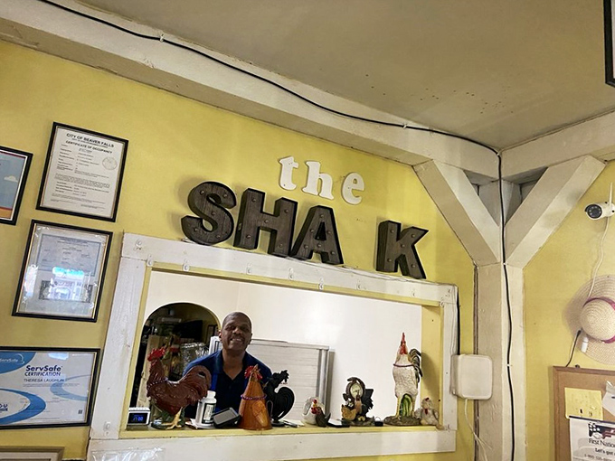 Behind the counter where the magic happens. Chicken figurines aren't just decoration&mdash;they're quality control supervisors.