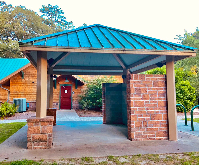 The park's visitor center welcomes explorers with rustic brick architecture and a turquoise roof that echoes the Delaware sky.