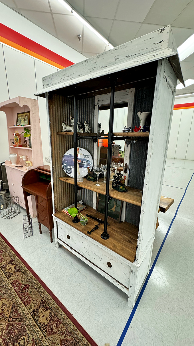 Farmhouse chic before it was trendy. This distressed cabinet blends rustic charm with industrial elements &ndash; Pinterest boards come to life in three dimensions.