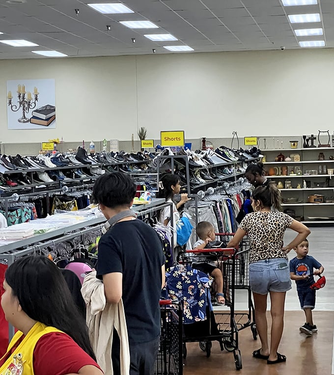 Families hunt together, proving thrifting is a sport best enjoyed with teammates who'll tell you when those pants are a definite no.