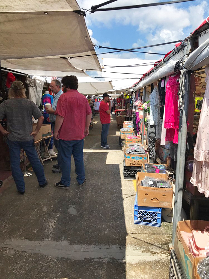 The outdoor section buzzes with weekend warriors hunting for deals under Florida's famous sunshine. The thrill of the hunt is palpable!