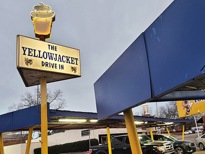 That illuminated ice cream cone sign doesn't just advertise dessert—it's a lighthouse guiding sweet-seekers to frozen happiness.