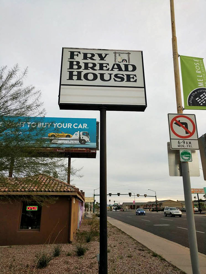 The sign stands as a beacon for bread-seekers. Like a lighthouse guiding ships to shore, it guides hungry souls to satisfaction.