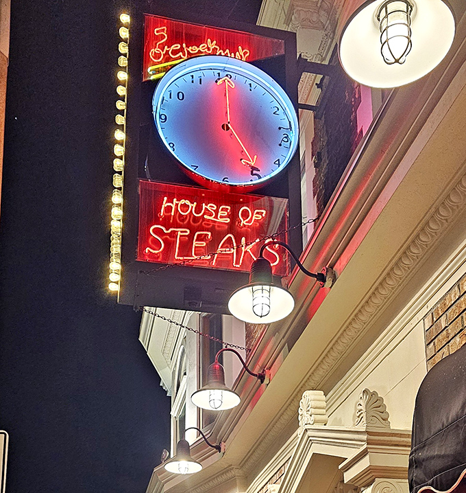 The neon clock sign glows like a beacon for beef lovers&mdash;it's always the right time for a perfectly cooked steak.