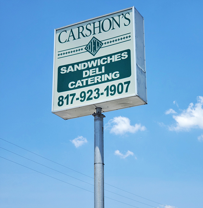 The roadside sign announces Carshon's presence with understated confidence. No flashy gimmicks needed when your sandwiches speak for themselves.