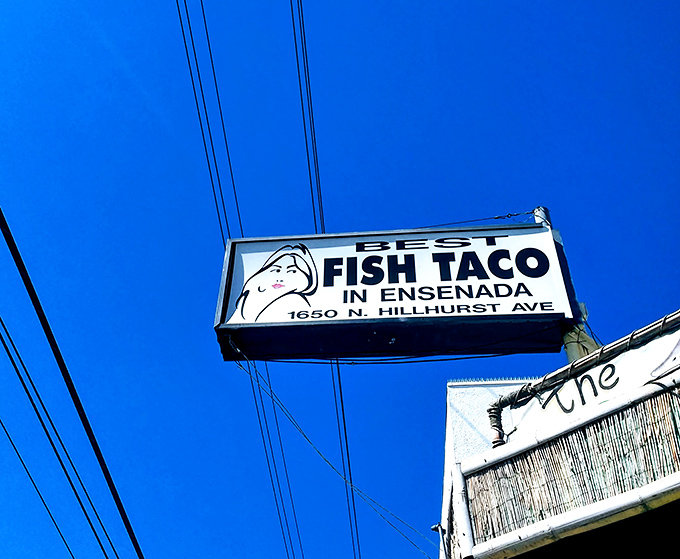 The sign that's guided countless hungry Angelenos to taco nirvana, standing tall against that impossibly blue California sky.