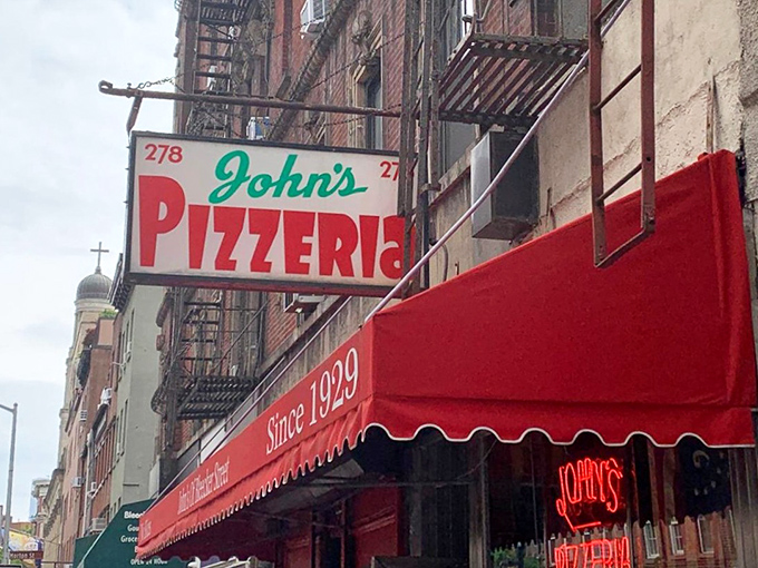 That vintage sign has guided hungry New Yorkers through depression, war, and disco &ndash; a beacon of pizza consistency in a changing city.