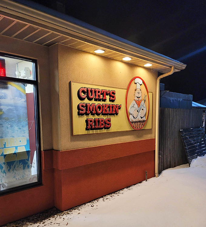Even in winter, that glowing sign serves as a beacon of hope for hungry travelers. BBQ waits for no season.