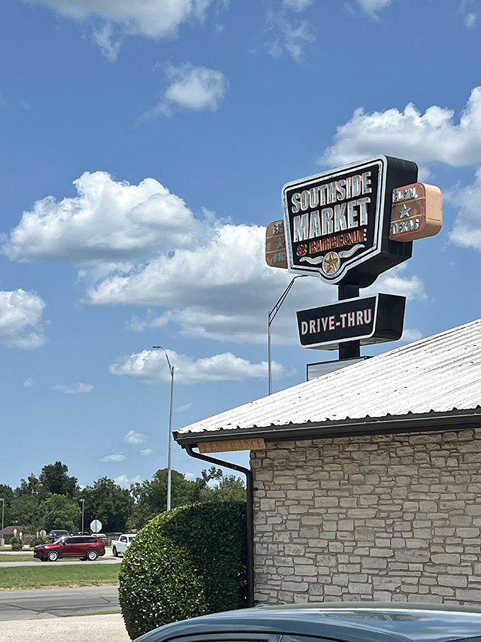 The iconic sign against a Texas blue sky &ndash; a beacon of hope for barbecue lovers and a landmark that's guided hungry travelers for generations.