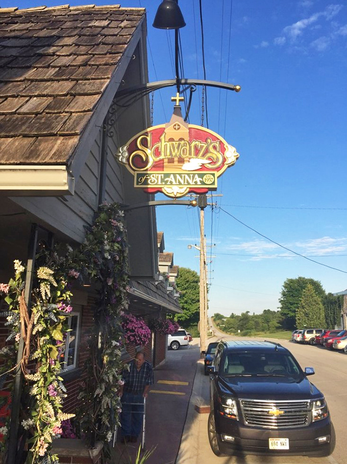 The sign doesn't just mark a location&mdash;it's a beacon for beef lovers. "Schwarz's of St. Anna" might as well read "Prime Rib Promised Land."