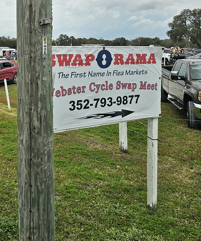 The sign says it all&mdash;"The First Name in Flea Markets" isn't just branding; it's a promise of the bargain bonanza that awaits beyond.
