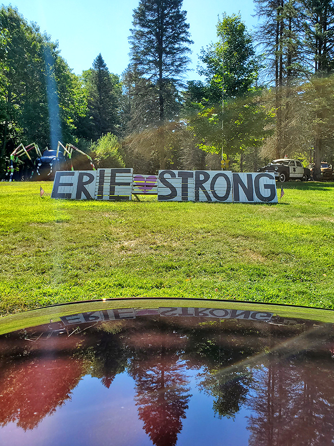 "Erie Strong" indeed&mdash;the community spirit shines through in this reflective display, where even roadside art speaks to local resilience.