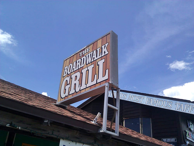 The sign proudly announces itself against the Florida sky, like a beacon guiding hungry travelers to their delicious destiny.