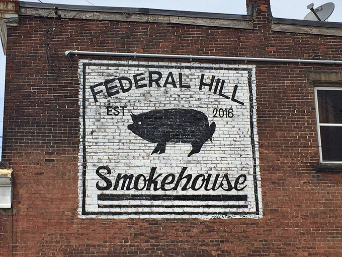 The painted wall sign proudly announces Federal Hill's presence &ndash; like a bat signal for those seeking serious smoked meat salvation.