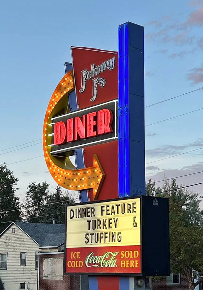 That sign doesn't just advertise a diner&mdash;it's a beacon of hope for hungry travelers, visible from blocks away like a delicious lighthouse.