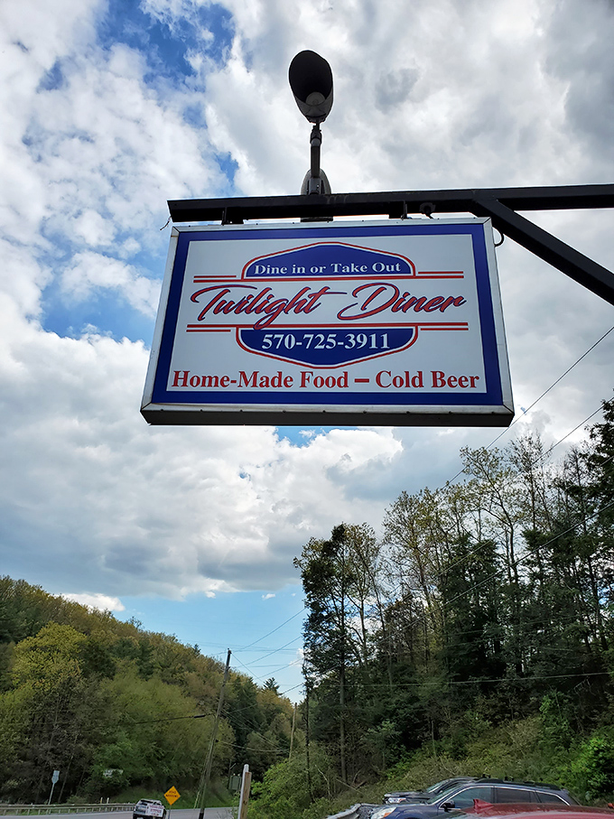 The promise of homemade goodness against Pennsylvania's blue skies. This sign doesn't just mark a location &ndash; it's a beacon for hungry travelers seeking authentic comfort.