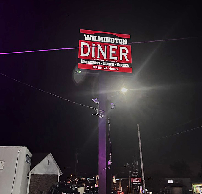 When darkness falls, the illuminated sign becomes a beacon for night owls and early birds alike&mdash;promising 24-hour comfort in a world that rarely stops.