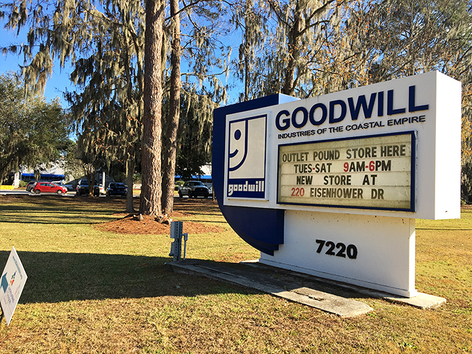 Standing sentinel among Spanish moss-draped trees, this sign welcomes treasure hunters to Savannah's best-kept shopping secret.