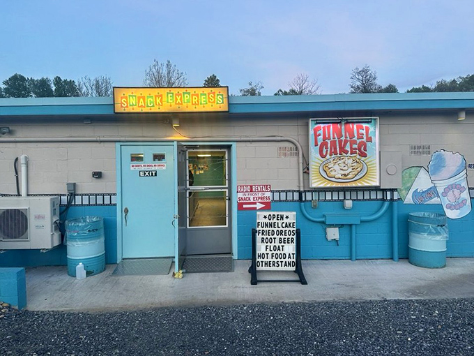 The Snack Express promises funnel cakes and fulfills dreams. Cinema cuisine headquarters where calories don't count under starlight.