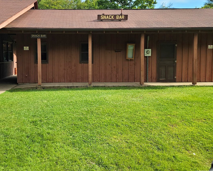 The humble snack bar&mdash;where trail mix meets hot chocolate. After conquering those 214 steps, that "SNACK BAR" sign looks like a beacon of hope.