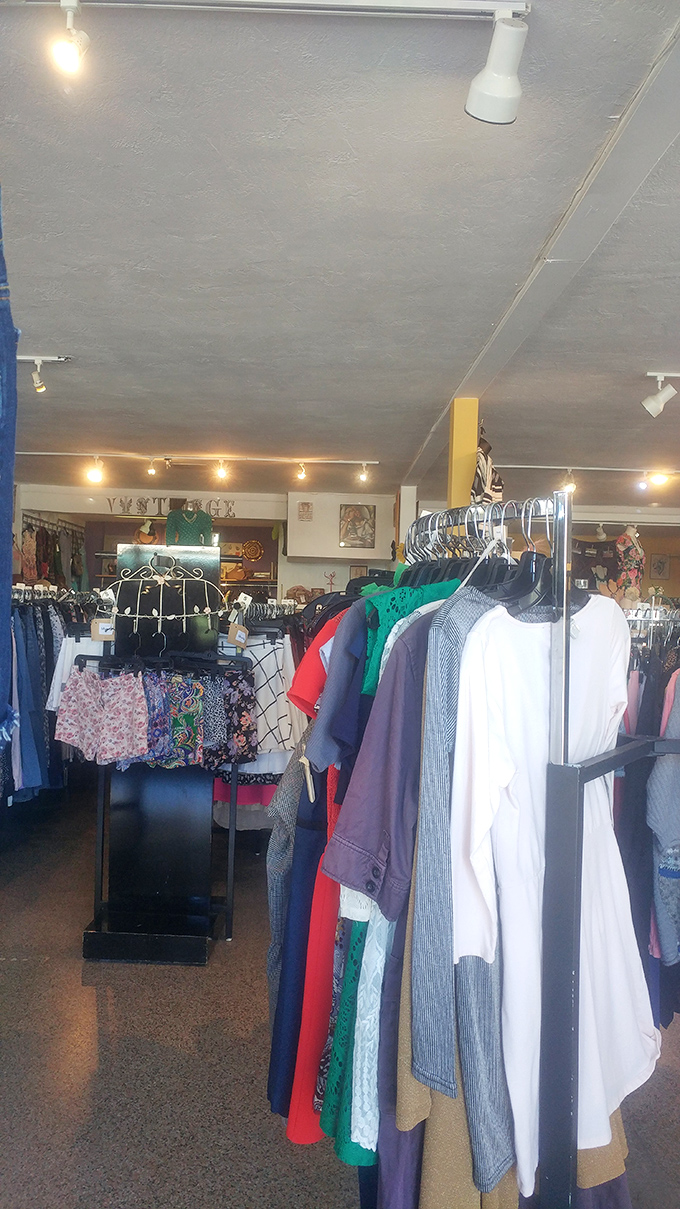 Bright lights illuminate fashion treasures. Every rack holds potential for that "you won't believe what I found" moment.