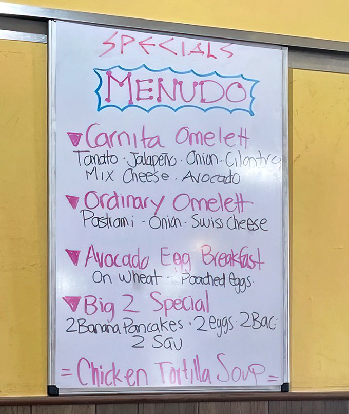 Daily specials scrawled with colorful markers promise off-menu treasures. The Carnita Omelet is calling your name.