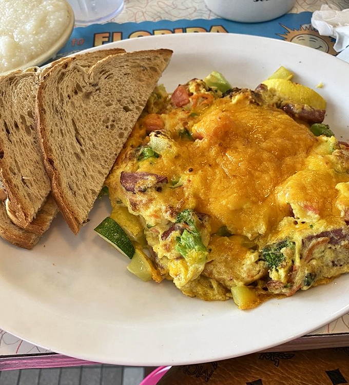 This hearty scramble doesn't just say good morning—it belts it out like Ethel Merman, with vegetables adding both color and the illusion of healthfulness.