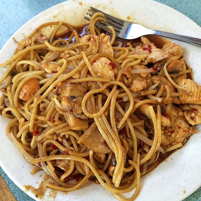 Spicy noodles tangled with chicken and vegetables – a dish that's having more fun than most people at a Saturday night party.