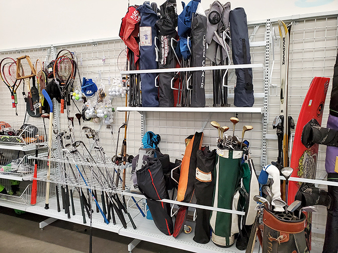 Sports equipment corner: where barely-used tennis rackets and golf clubs reveal the optimistic fitness resolutions of strangers past.
