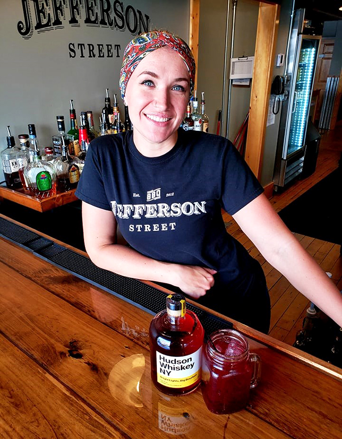 Behind every great BBQ joint is a team that understands the sacred trust of properly smoked meat. That smile says, "Yes, the brisket is especially good today."