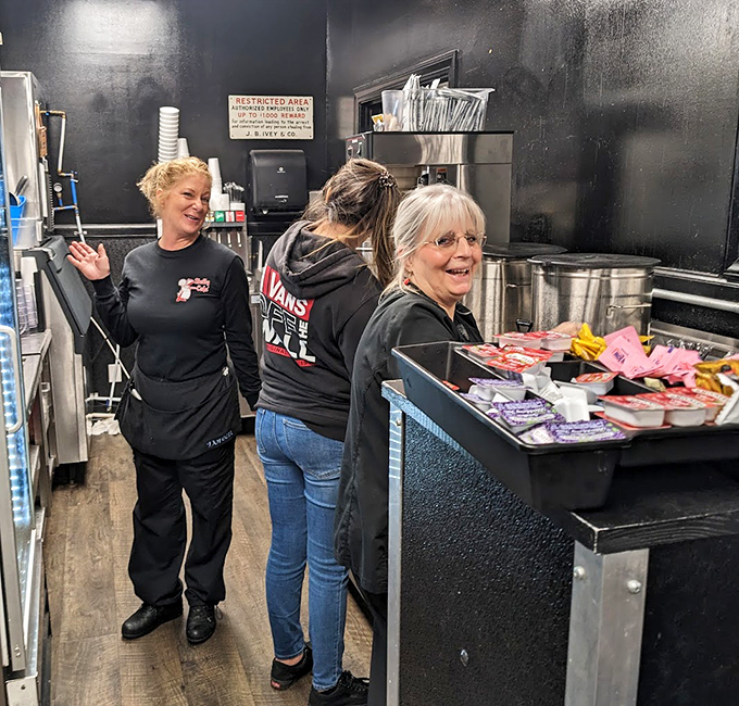 The staff moves with choreographed efficiency, carrying decades of collective experience and the secret ingredient to every dish: genuine hospitality.