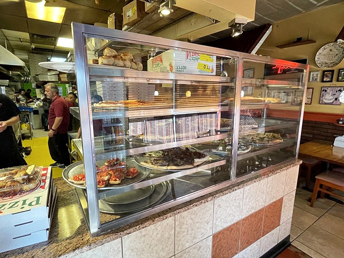 Where the magic happens&mdash;Tony's kitchen crew crafts Italian classics while customers eagerly await their turn at the display case of dreams.