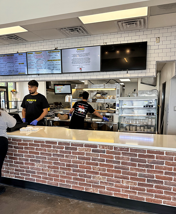 The team behind the crispy goodness, working with practiced precision. These culinary craftspeople are the unsung heroes of your flavor experience.