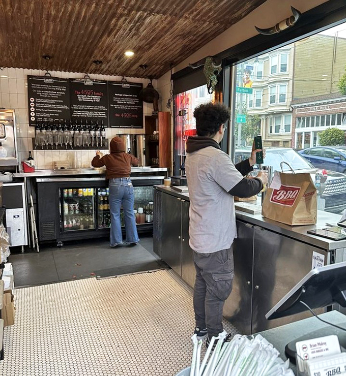 The takeout counter &ndash; where hope meets hunger and brown paper bags become treasure chests filled with smoky gold.