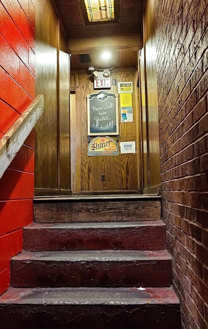 The entrance stairway feels like a secret passage to flavor town, with each step building anticipation for what awaits above.