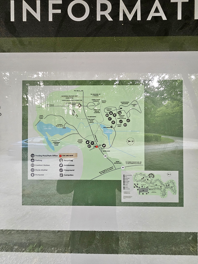 The park map - a treasure chart for grown-ups where X marks the spot for bathrooms, picnic areas, and places to pretend you're lost.