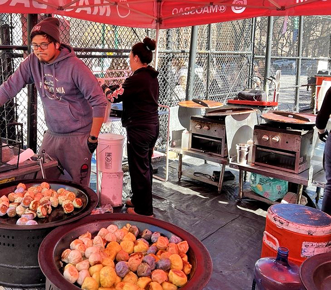 The food vendors offer delicious respite for weary shoppers—these steamed buns providing the fuel for another round of bargain hunting.