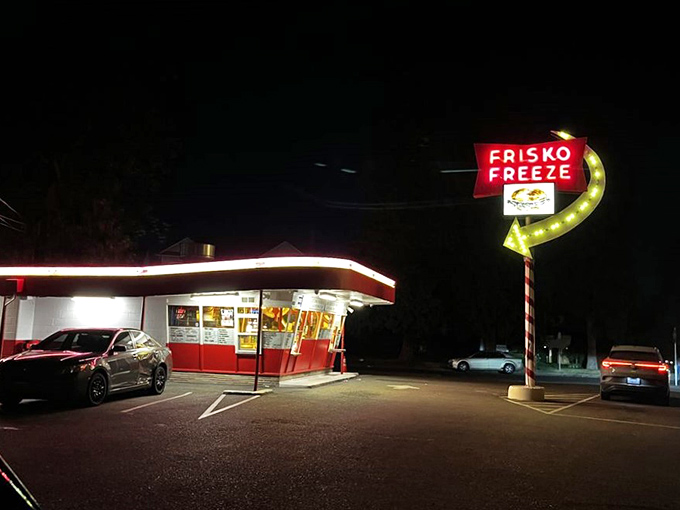 As darkness falls, the neon glow of Frisko Freeze becomes a lighthouse guiding hungry night owls to safe harbor.