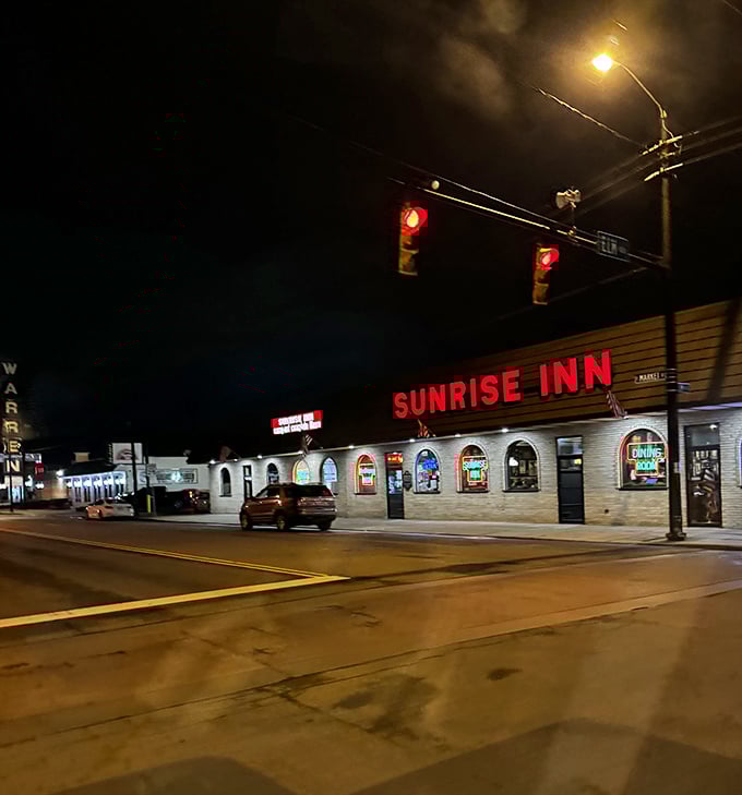 After dark, Sunrise Inn's glowing sign serves as Warren's nocturnal North Star for the hungry and the thirsty alike.