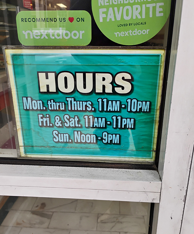 Business hours posted clearly—because knowing exactly when you can satisfy your Little Anthony's craving is essential information for Media locals.