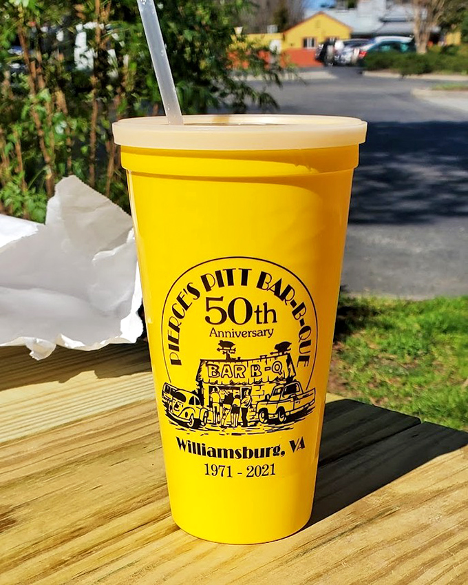 The iconic yellow cup of sweet tea &ndash; so sweet it could almost be dessert &ndash; bearing the proud mark of 50 years of barbecue tradition.