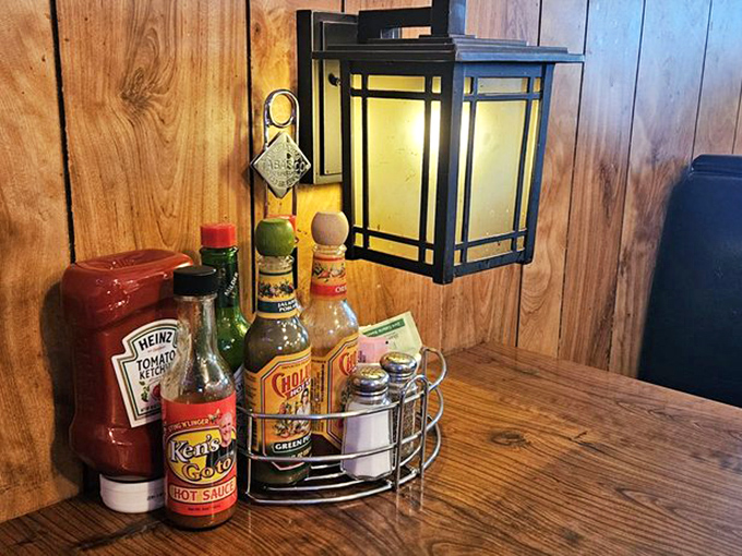 The condiment caddy&mdash;that unsung hero of breakfast tables everywhere. Hot sauce options are the true measure of a diner's character.