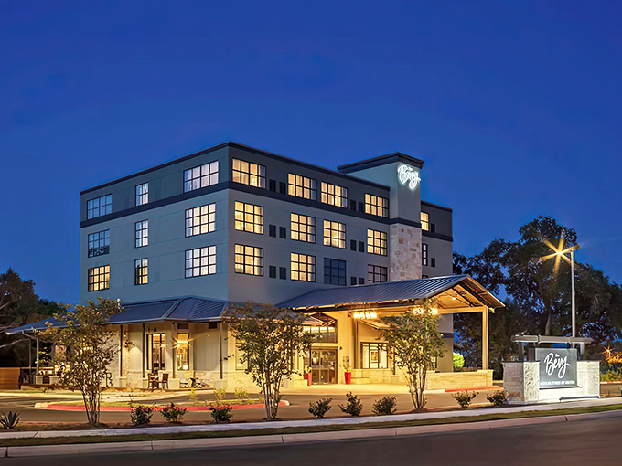 The Bevy Hotel glows with Hill Country hospitality after sunset, offering upscale accommodations without the pretension you might find in bigger cities.