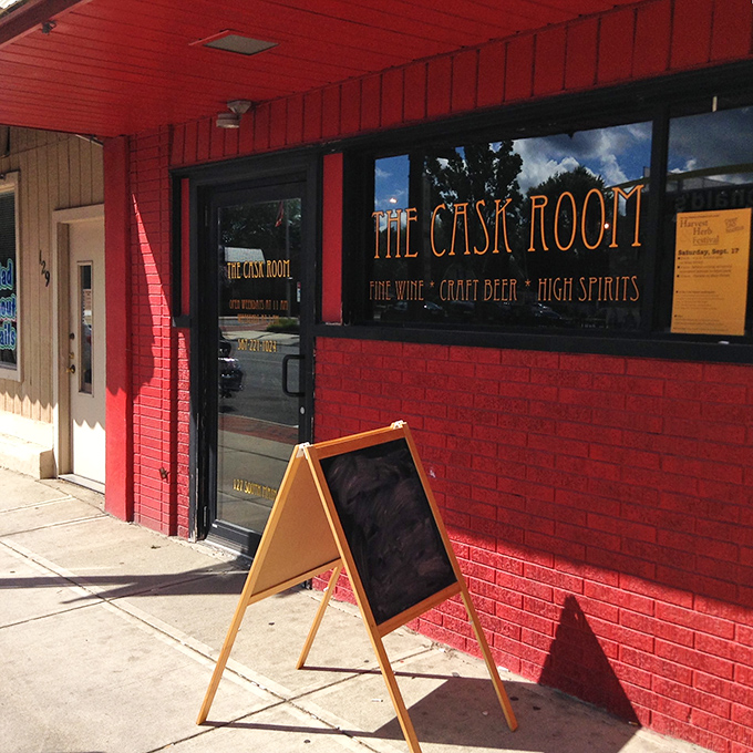 The Cask Room's vibrant red exterior signals that sophisticated sips aren't just for big cities&mdash;Ada knows its craft beverages too.