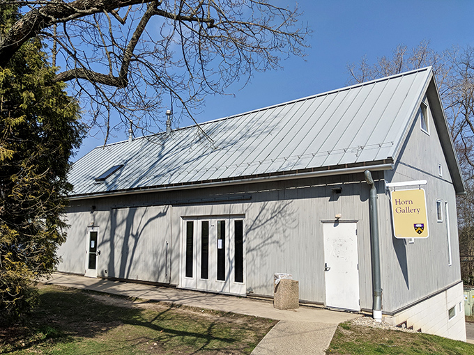 The Horn Gallery's modern simplicity contrasts with campus Gothic architecture. Proof that Gambier embraces both tradition and innovation under one metal roof.
