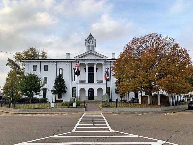 The Lafayette County Courthouse stands like a white-columned wedding cake at Oxford's center, its clock tower keeping time for the literary capital of the South.