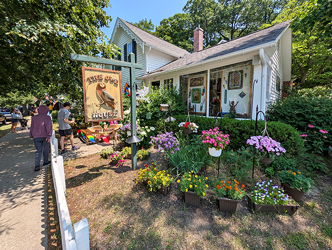 The Owl House garden bursts with flowers and whimsy, making every visit feel like a discovery.